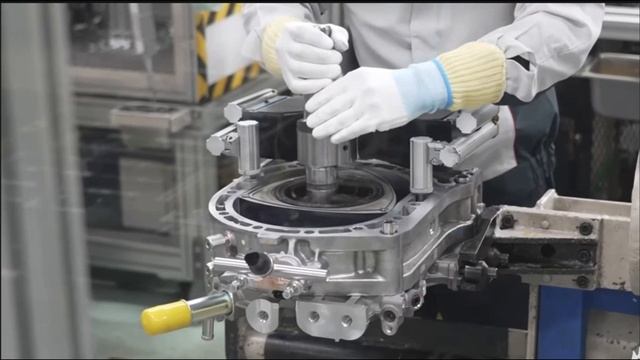 Япония -процесс сборки  эл.мобиля- Mazda-