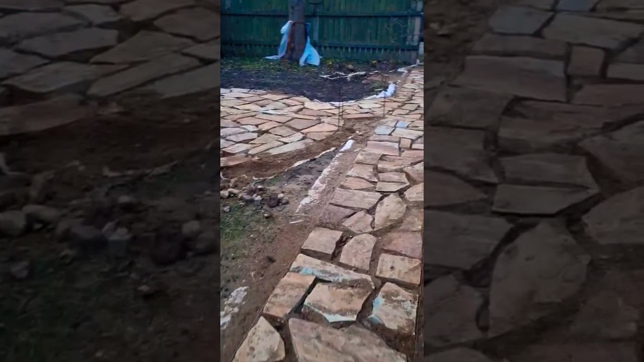 Укладка плитняка на участке.