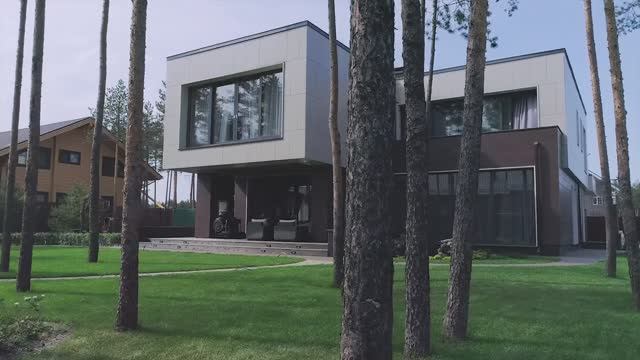 Современный дом с плоской кровлей в стиле минимализм по проекту М280