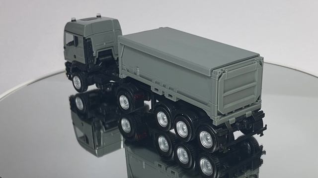 Модель MAN TGS TM с полуприцепом-контейнеровозом для мусора