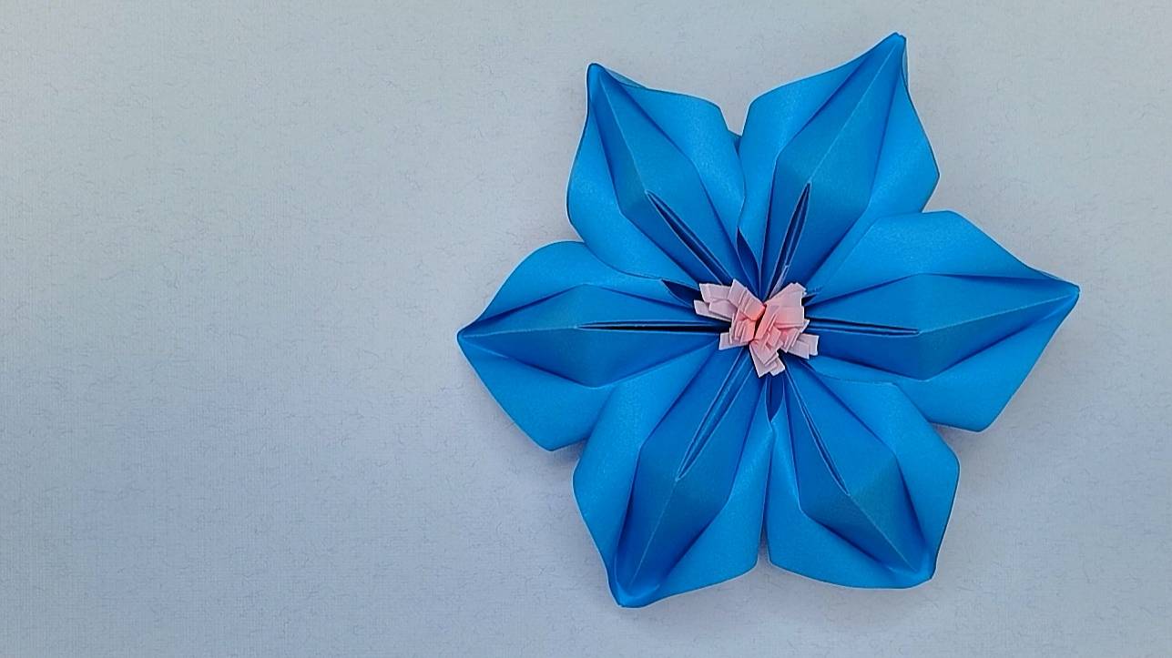 Как сделать объёмный цветок из бумаги.