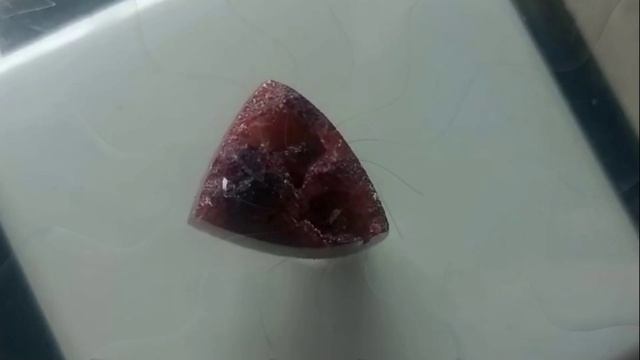 Турмалин:  кабошон  с кристаллами на верхней поверхности