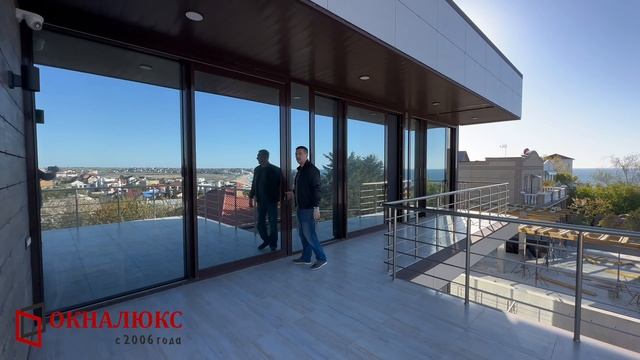 Остекление дома в алюминиевом профиле Alutech с мультифункциональными стеклами Silver. ОКНАЛЮКС