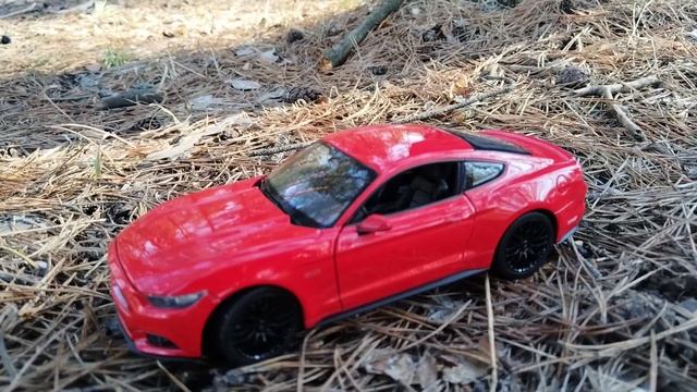 Модель Ford Mustang шестого поколение от  Welly