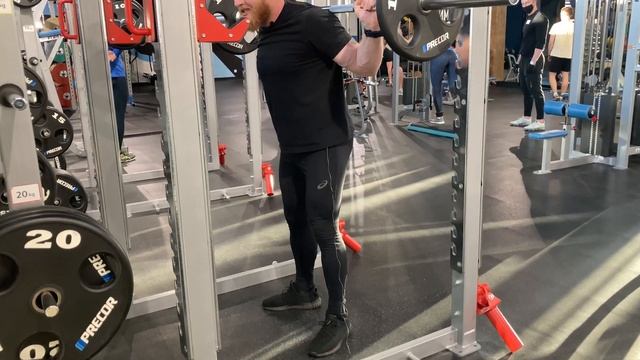 Приседания со штангой на спине