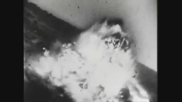Strafing of train. Exploding boxcar damaging aircraft