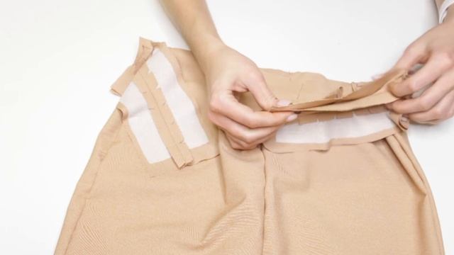 Примётывание пояса к юбке