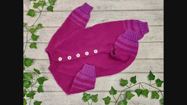 Вязаный комбинезон спицами.