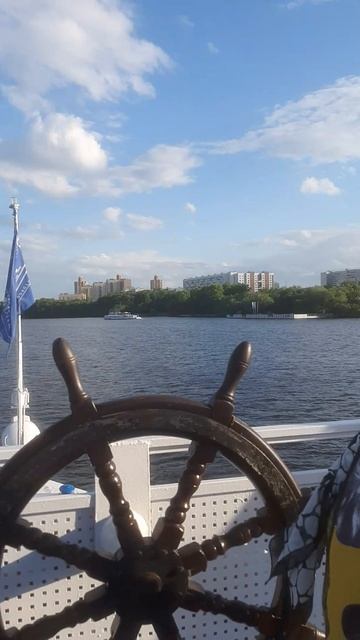 У штурвала.