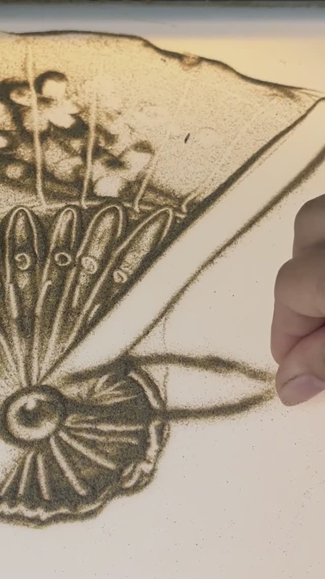Веер. Китай. Рисование песком