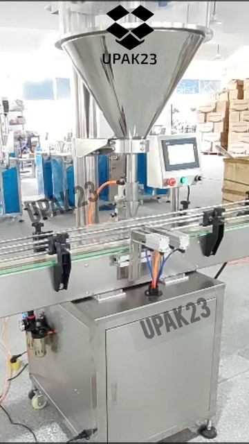 Часть автоматической линии фасовки шнековым дозатором