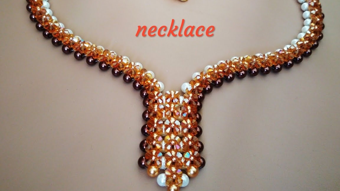 Колье из  бусин и биконусов
