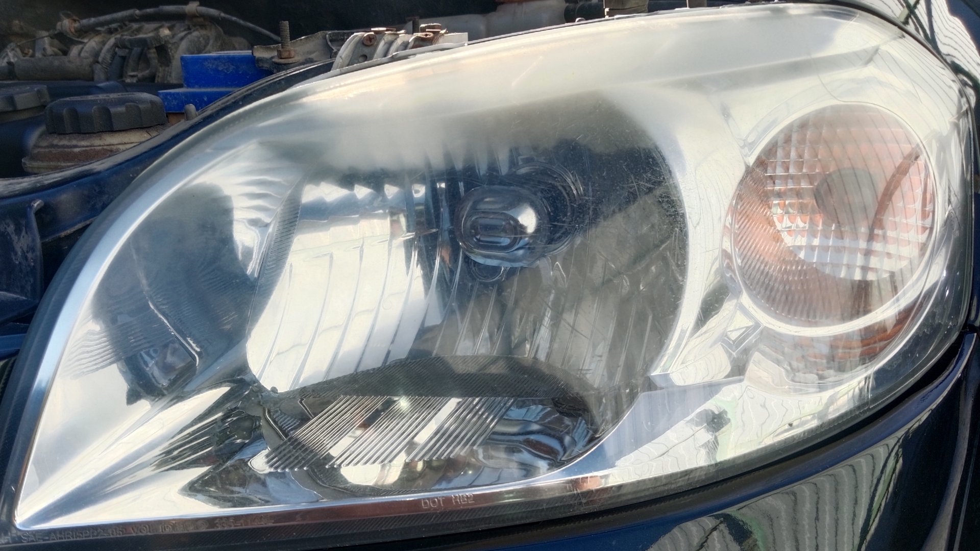 Как поменять лампочку ближнего и дальнего света Шевроле Авео.