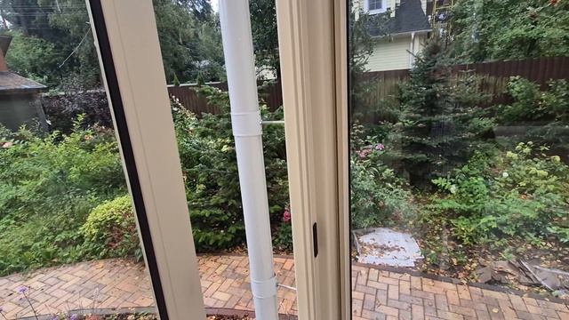 Обзор террасы к дому с прозрачнойкрышей,  сдвижное остекление