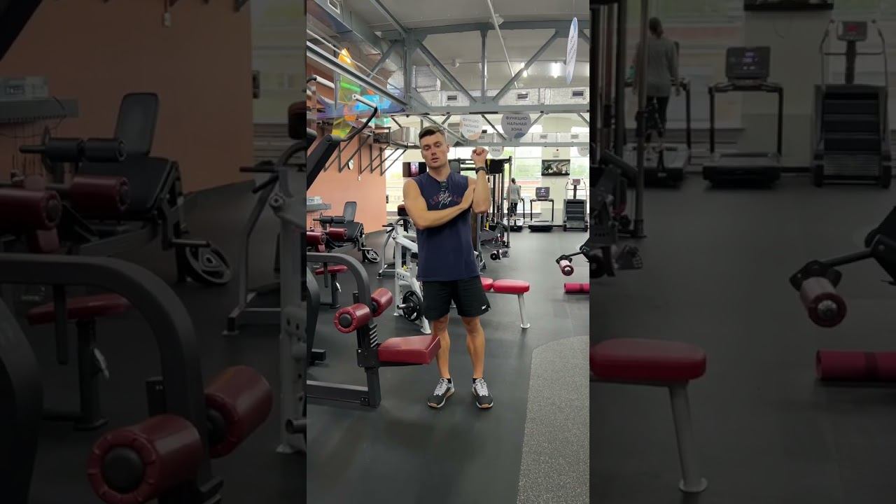 Вертикальная тяга в рычажном тренажере