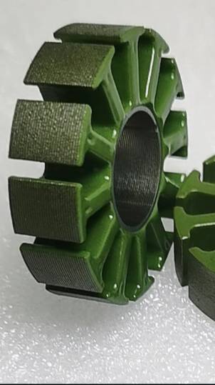 Станок для порошковой электроизоляции обмотки статора двигателя.