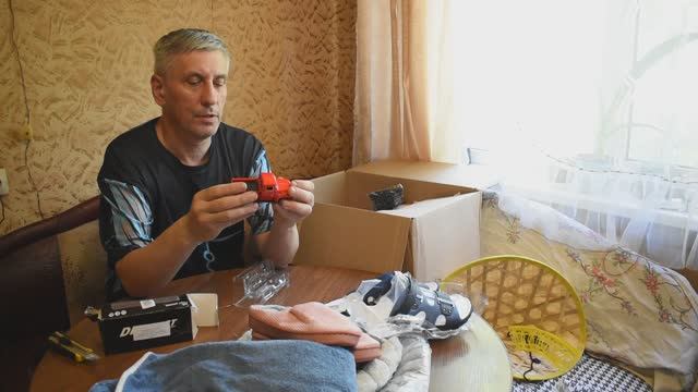 Распаковка 12 коробки товара.