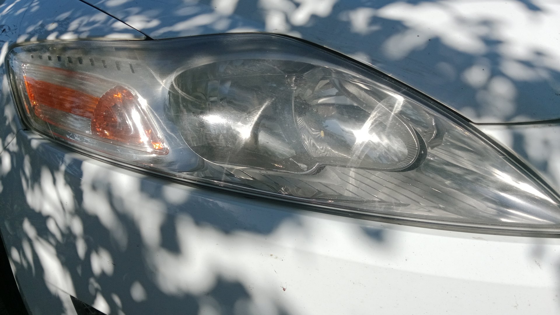 Как поменять лампочку ближнего света Ford Mondeo 4