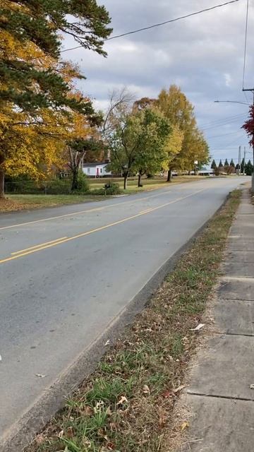 riding a bike uphill in Gastonia. Picturesque Fall view