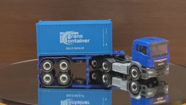 Модель MAN TGS NN с контейнеровозом и контейнером в масштабе 1:87