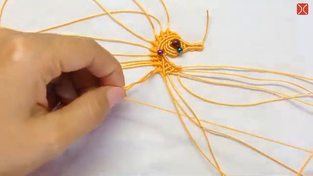 Брелок морской конек в технике ювелирного макраме.