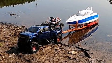 ВИДЕО ПРО МАШИНКИ ДЛЯ МАЛЬЧИКОВ НА РАДИОУПРАВЛЕНИИ ВЕЗЕМ ЯХТУ К ВОДЕ КАТАТЬСЯ ИГРУШКИ МАШИНКИ