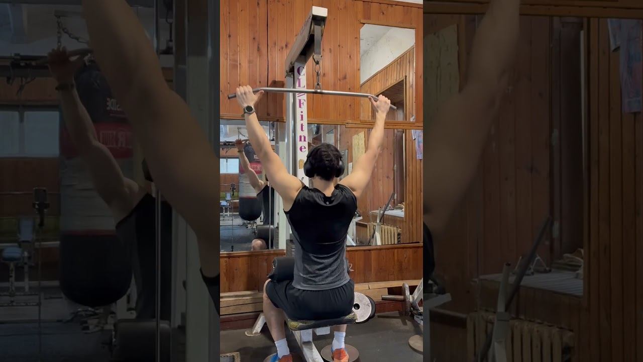 Вертикальная тяга широким хватом