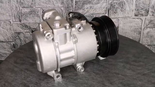 Компрессор кондиционера Kia Carens 855001DM00