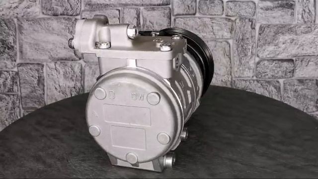 Компрессор кондиционера Kia Carens 855001D100