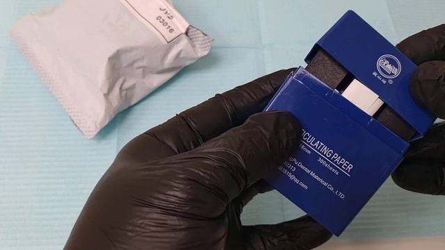 Артикуляционная бумага для регистрации прикуса.