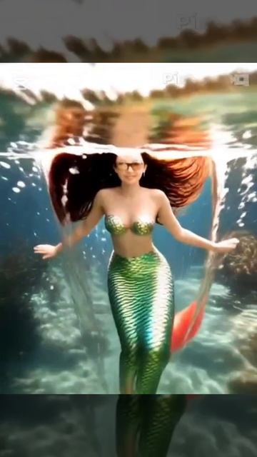 Я русалочка.