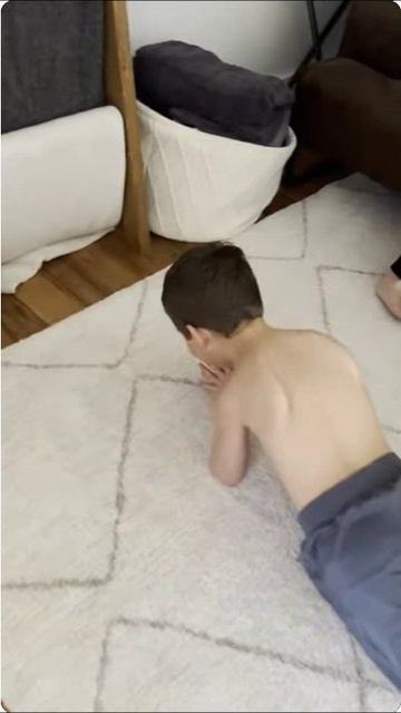 Bowen doing a plank for 12 minutes