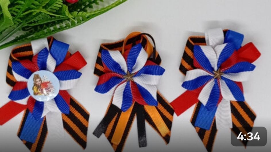 МК. Три разных георгиевских значка по одной схеме.