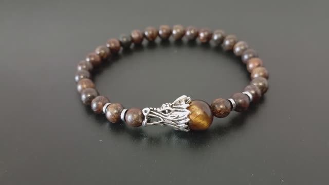 Браслет из бронзита с головой дракона.  Украшения талисманы