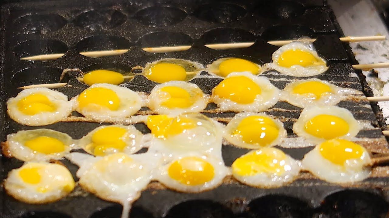 Мини-яйца перепелов - уличная еда Бангкока