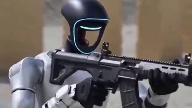 Китай показал как человекоподобные дроиды, используя обычное человеческое оружие, ведут стрельбу, пе