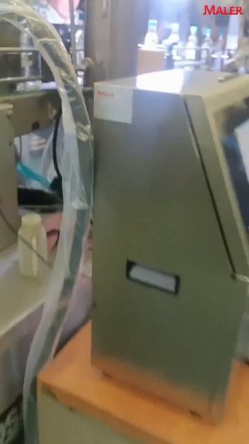 Нанесение маркировки на стеклянные бутылки каплеструйным принтером Maler-466-CIJ