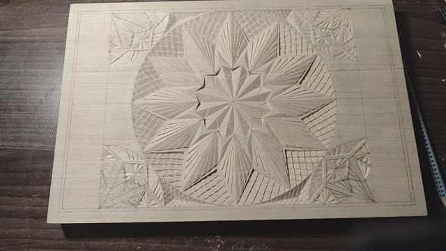 Работа в стиле геометрической резьбы.