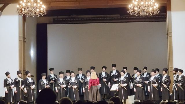 Мужской хор. Дирижёр О. Джанаева