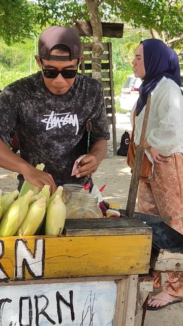 продавец кукурузы