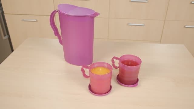Tupperware Moscow | Кувшин «Очарование» (2,1 л): облепиховый и клюквенный морсы