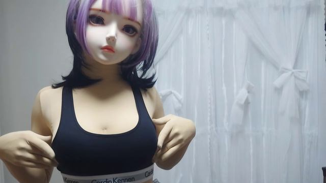 Кигуруми-кукла в прикиде для фитнеса.)