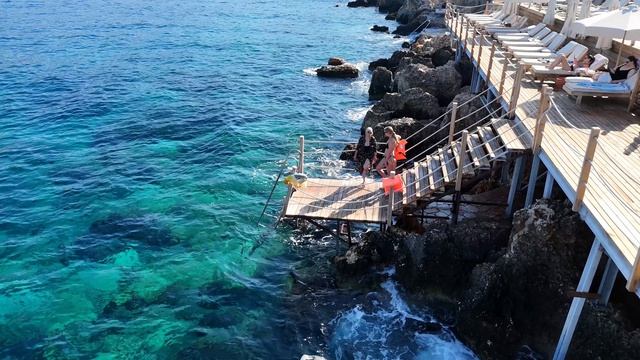 Turquoise Seaside Escape | Mediterranean Deck Above the Water