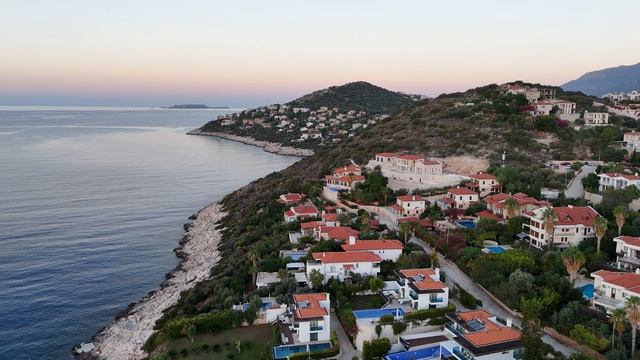 Kas, Antalya - hillside villas, pastel sky, and endless sea