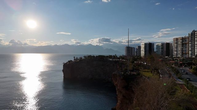 Antalya, Lara - cliffs, sea, skyline, and mountains in one view