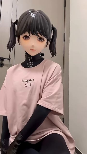 Kigurumi Doll in zettai catsuit, latex gloves and t-shirt.