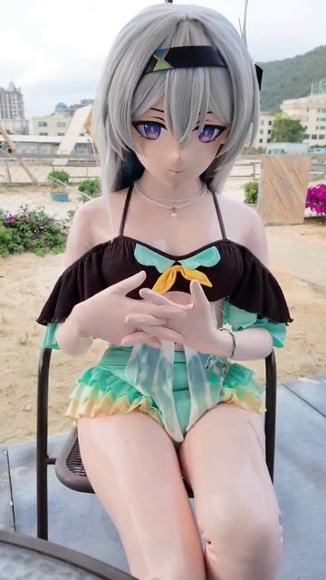 Latex Kigurumi Doll in swimsuit.