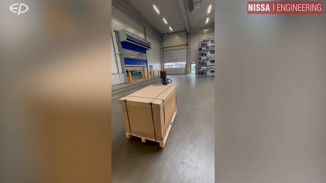 Автоматический паллетоперевозчик XP15 против автоматической двери в Voestalpine