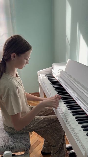 Маргарита играет Е.Девис «Облака»
