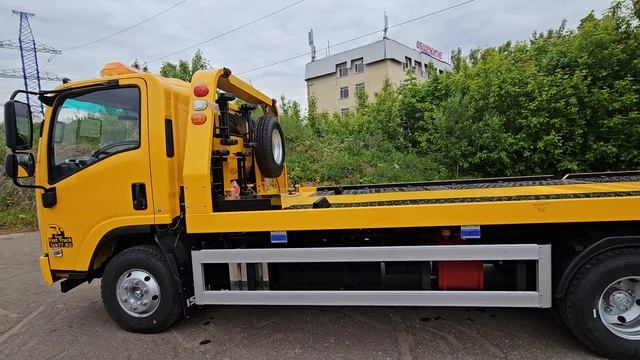 Видеообзор4 эвакуатор ISUZU ELF KV100-600 желтый ISUZU ELF KV100 P700 P100 🚚ISUZU ELF2026